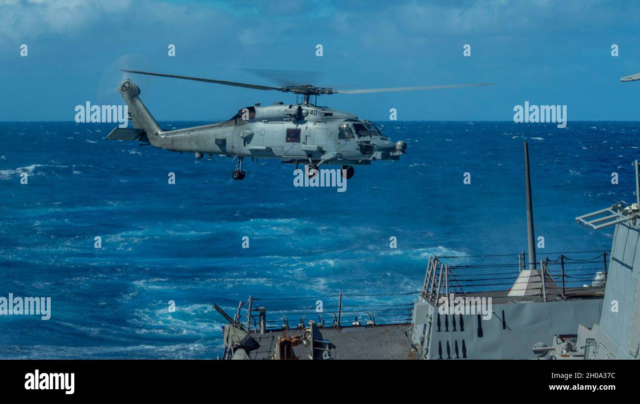 PACIFIC OCEAN (Jan. 1, 2021) A U.S. Navy MH-60R Sea Hawk, assigned to ...