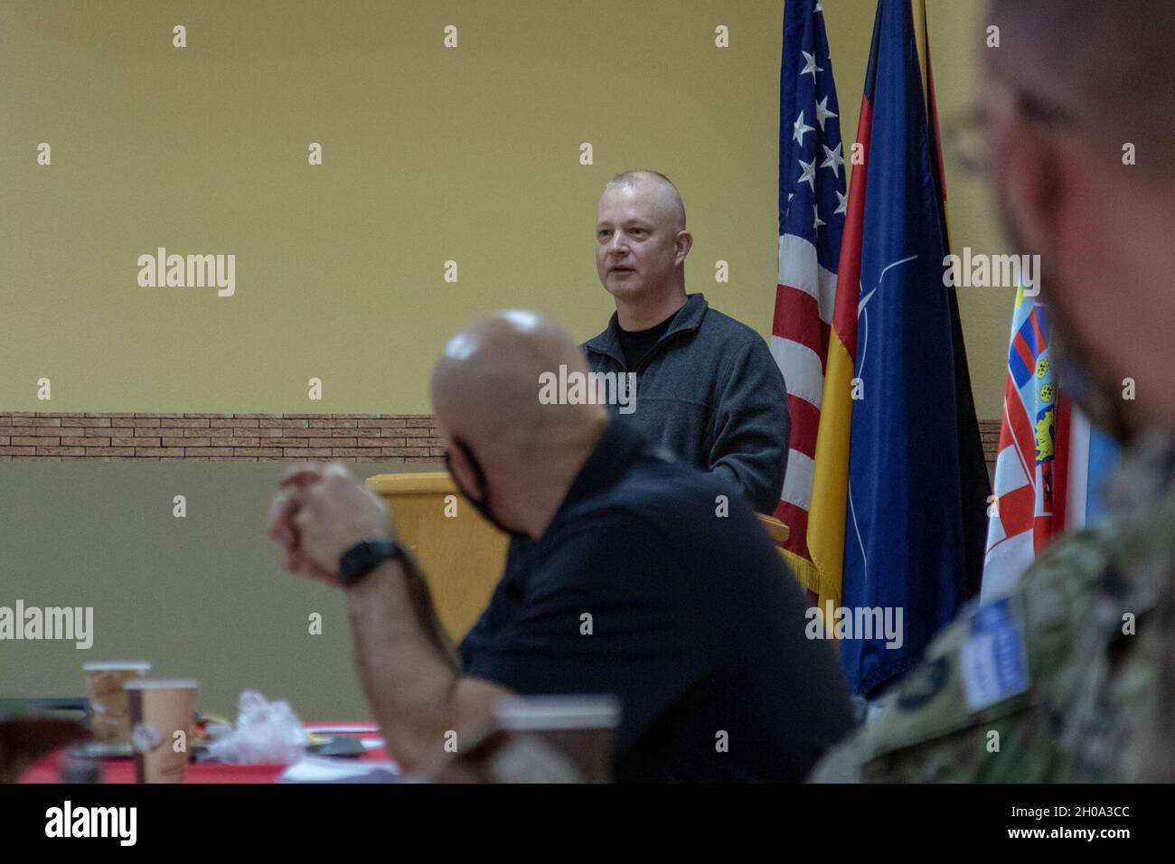 Col. Derek Adams, Commander for KFOR’s Regional Command East, speaks to ...