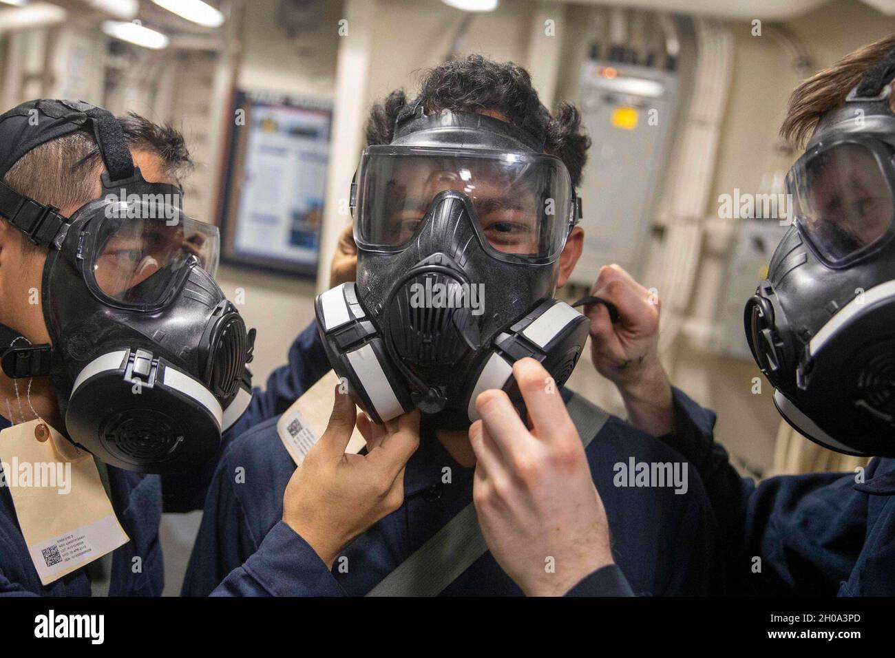 INDIAN OCEAN (Jan. 2, 2021) – U.S. Sailors don gas masks during a ...
