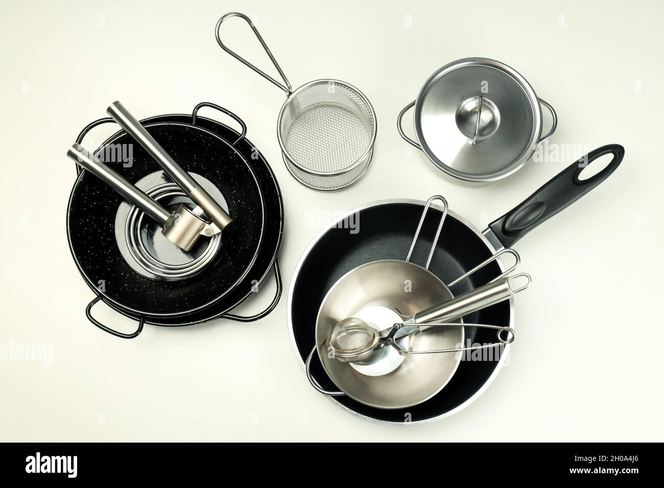 Set of different kitchen utensil on white background Stock Photo - Alamy