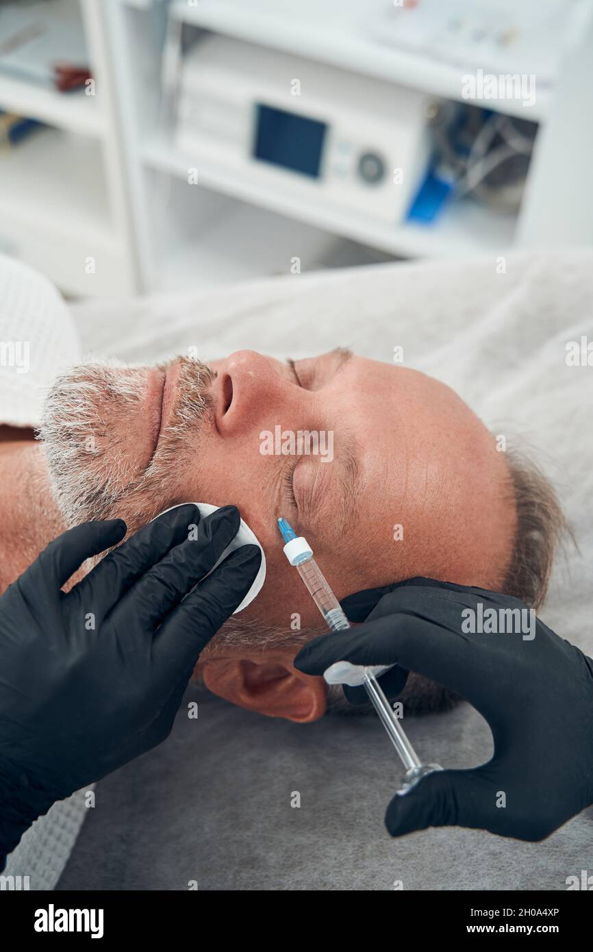Man having injection in hi-res stock photography and images - Alamy