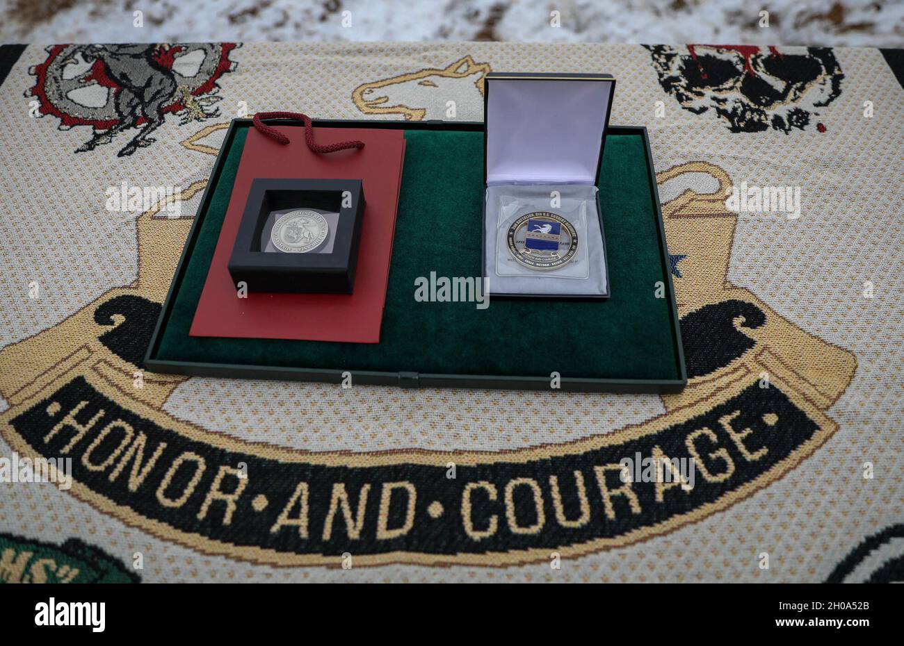 Challenge coins from Lithuania’s Minister of Defense, left, and 2nd ...