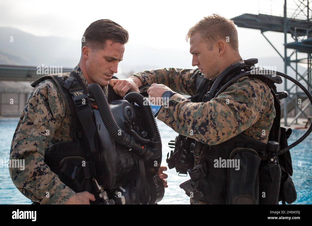 U.S. Navy Hospital Corpsman 3rd Class Wayne Jaworski, right, a special ...