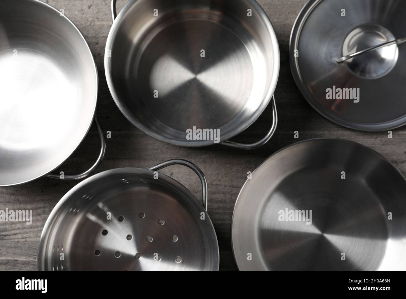 Kitchen utensil on gray textured table, top view Stock Photo - Alamy
