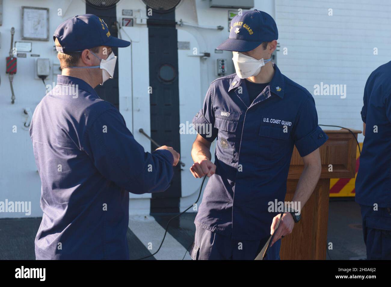 U.S. Coast Guard Senior Chief Petty Officer Heath Reid presents Petty ...