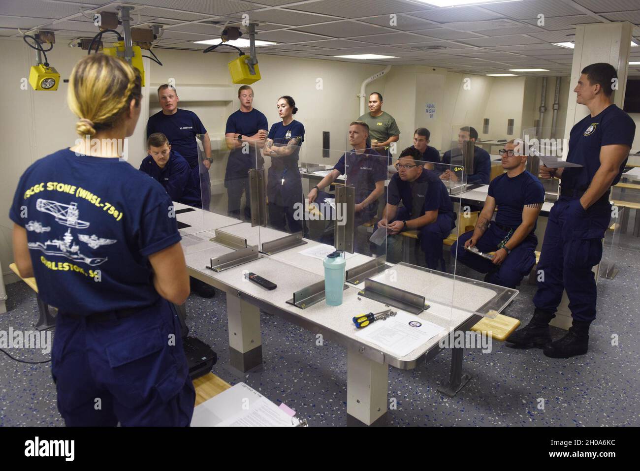 U.S. Coast Guard Lt. j. g. Alicen Re provides training to other USCGC ...