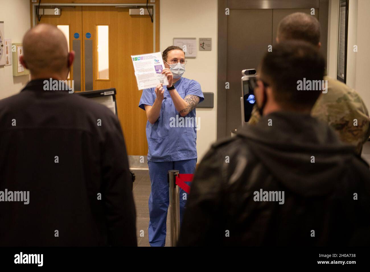 U. S. Air Force Staff Sgt. Morgan Mack, center, 423rd Medical Squadron ...