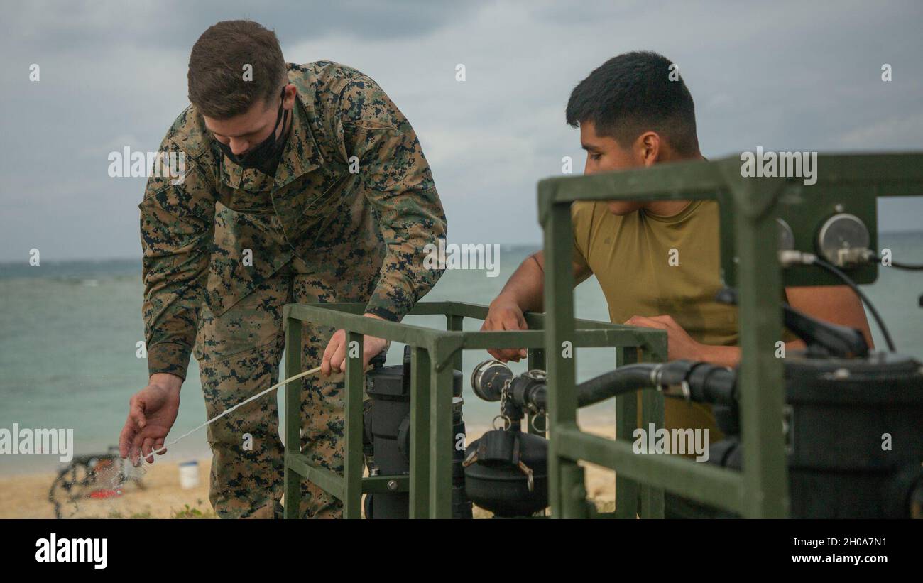 U.S. Marine Corps Lance Cpl. Ryan Wood, left, and Lance Cpl. Samuel ...