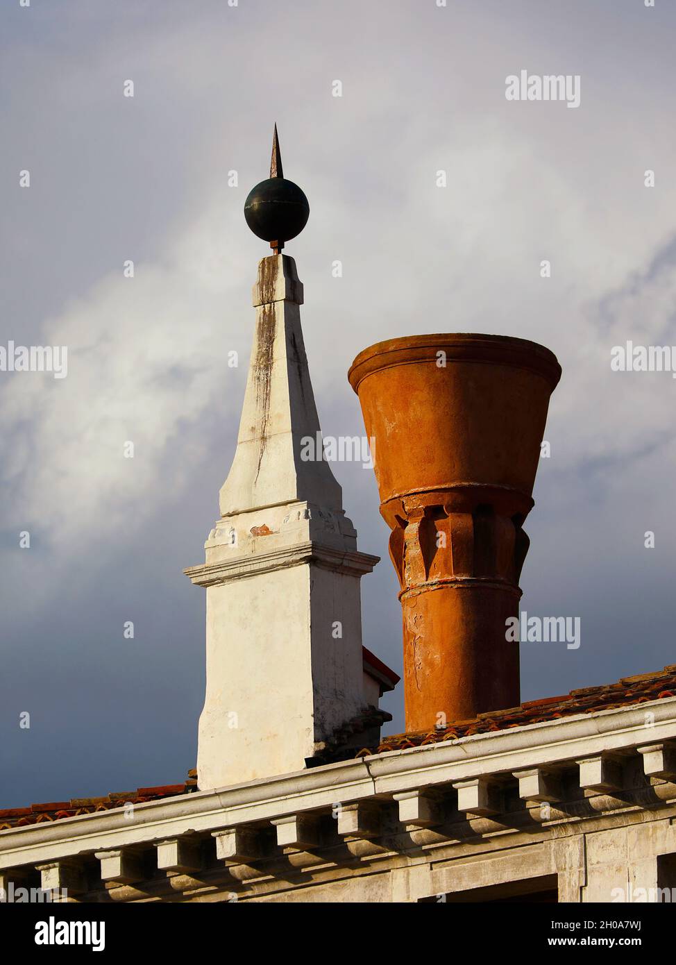 Venice old and characteristic architectures. Stone pinnacle and ceramic ...