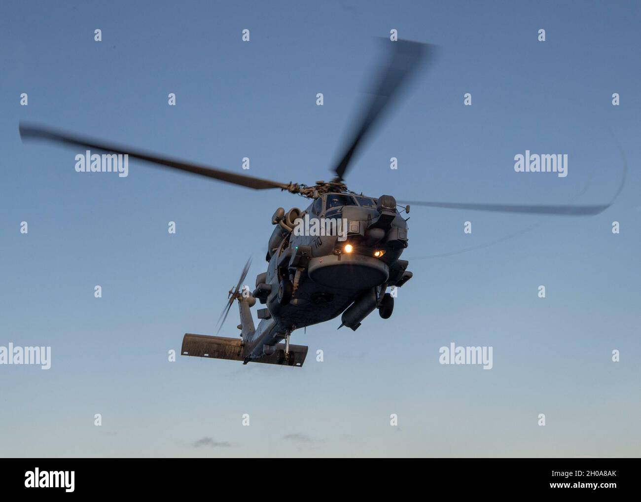 PACIFIC OCEAN (Jan. 6, 2021) An MH-60R Sea Hawk, assigned to the “Wolf ...