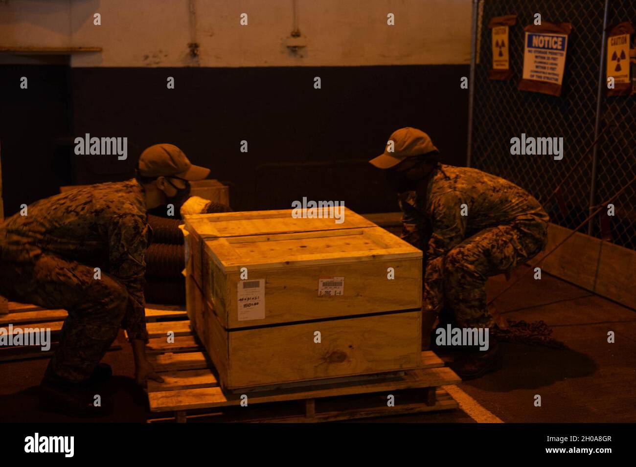 U.S. Navy Boatswain’s Mate Seaman Apprentice Jacob West, left, from ...
