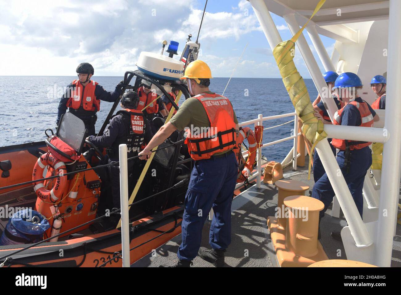 The crew on the USCGC Stone (WMSL 758) prepare to launch one of the ...