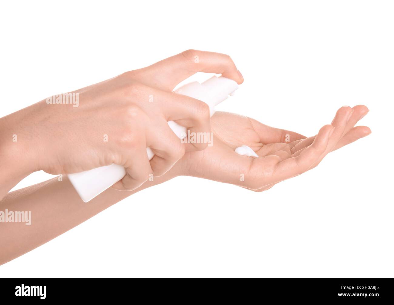 Young woman applying hand cream against on white background Stock Photo ...