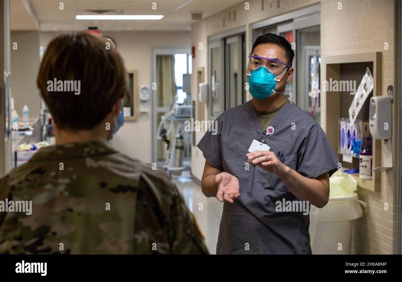 U.S. Army Capt. Wootae Cheon, right, a registered nurse with Urban ...