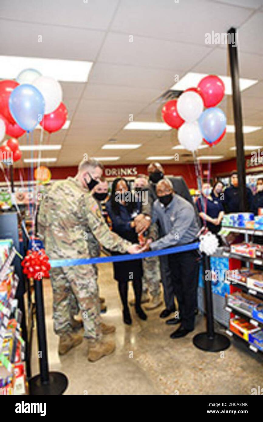 Cutting the ribbon at the Express 3 reopening Jan. 6 are, from left to ...