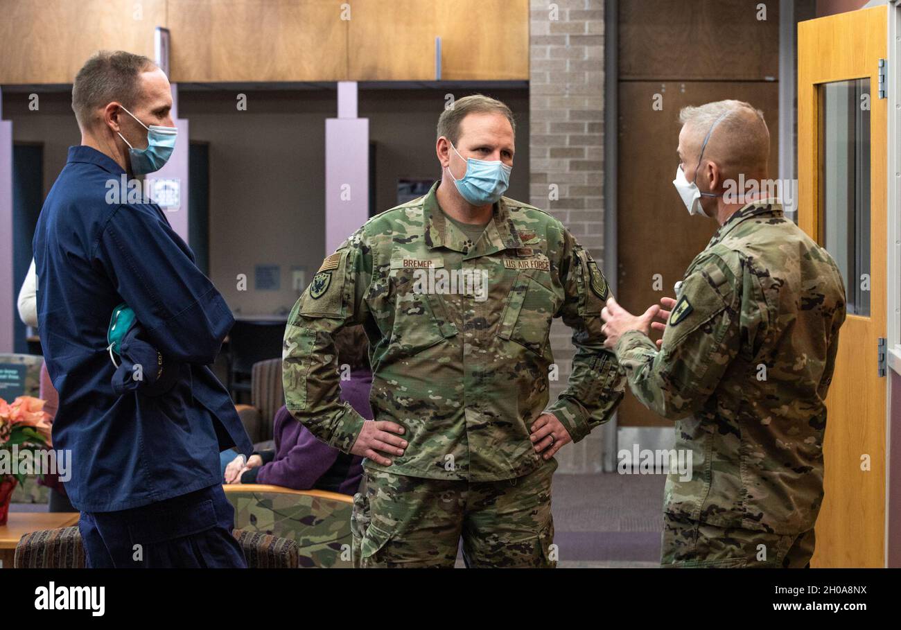U.S. Army Lt. Col. Michael Wissemann, right, a liaison officer with ...