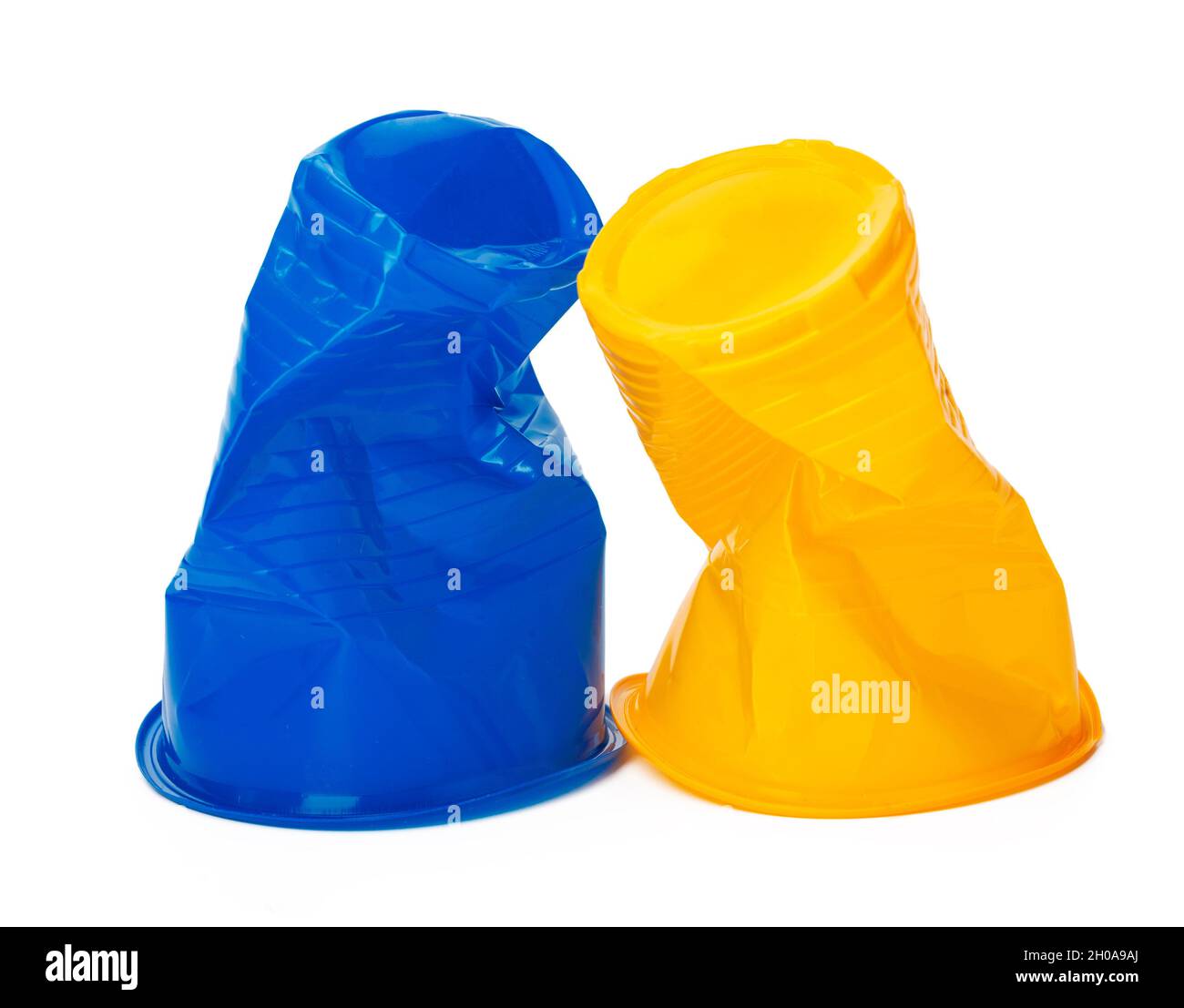 Crumpled plastic cup isolated on white background Stock Photo - Alamy