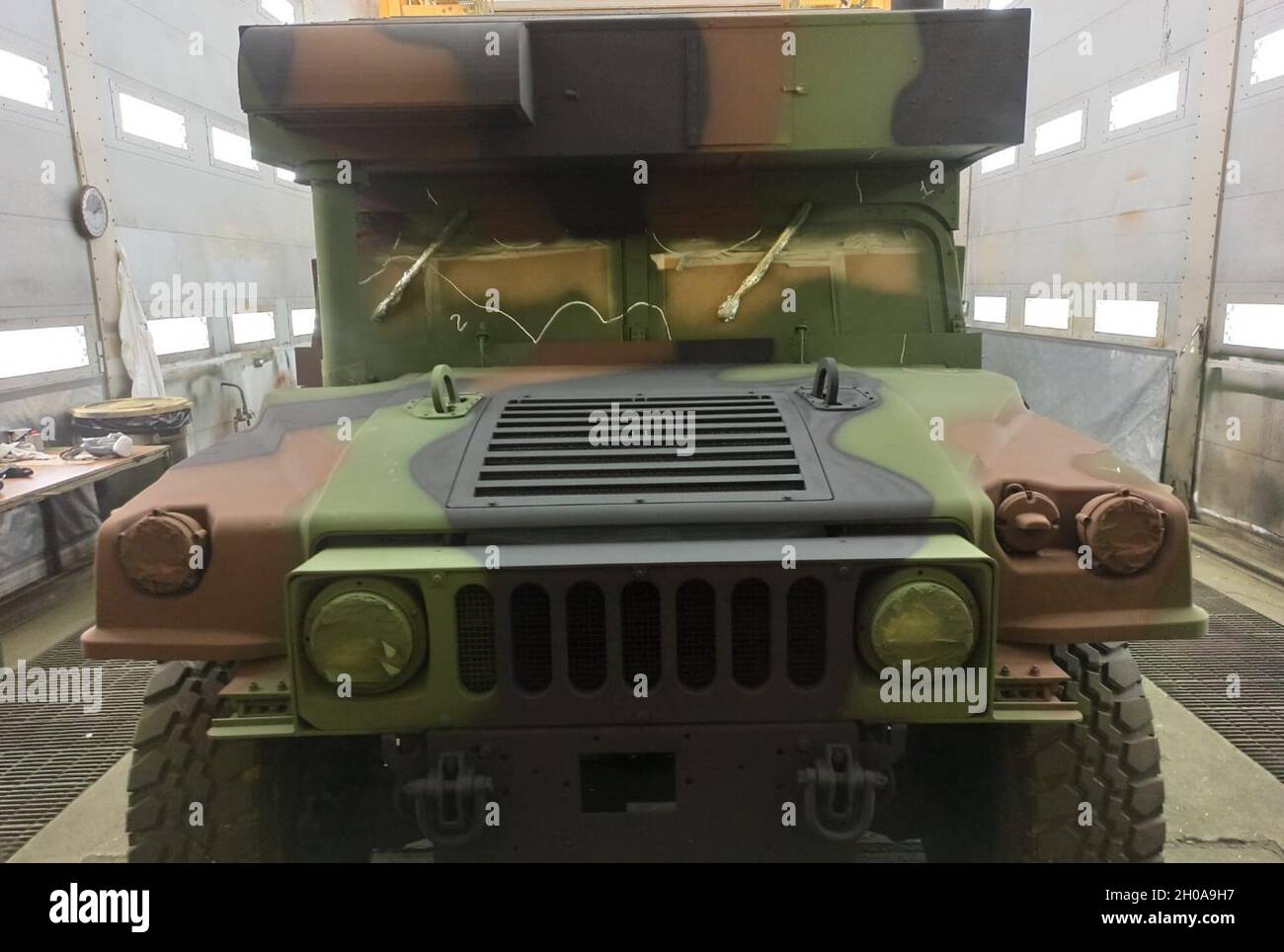 An Army humvee gets a facelift and a fresh coat of paint at Leghorn ...