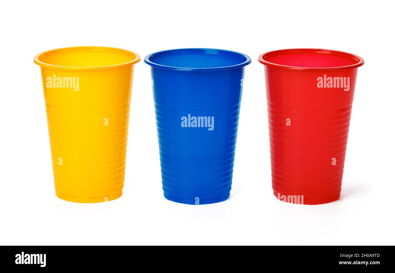 Pile of plastic cups on white background Stock Photo - Alamy