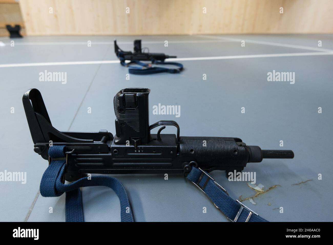 Fabrique Nationale UZI lay on the floor as members of the Belgian ...