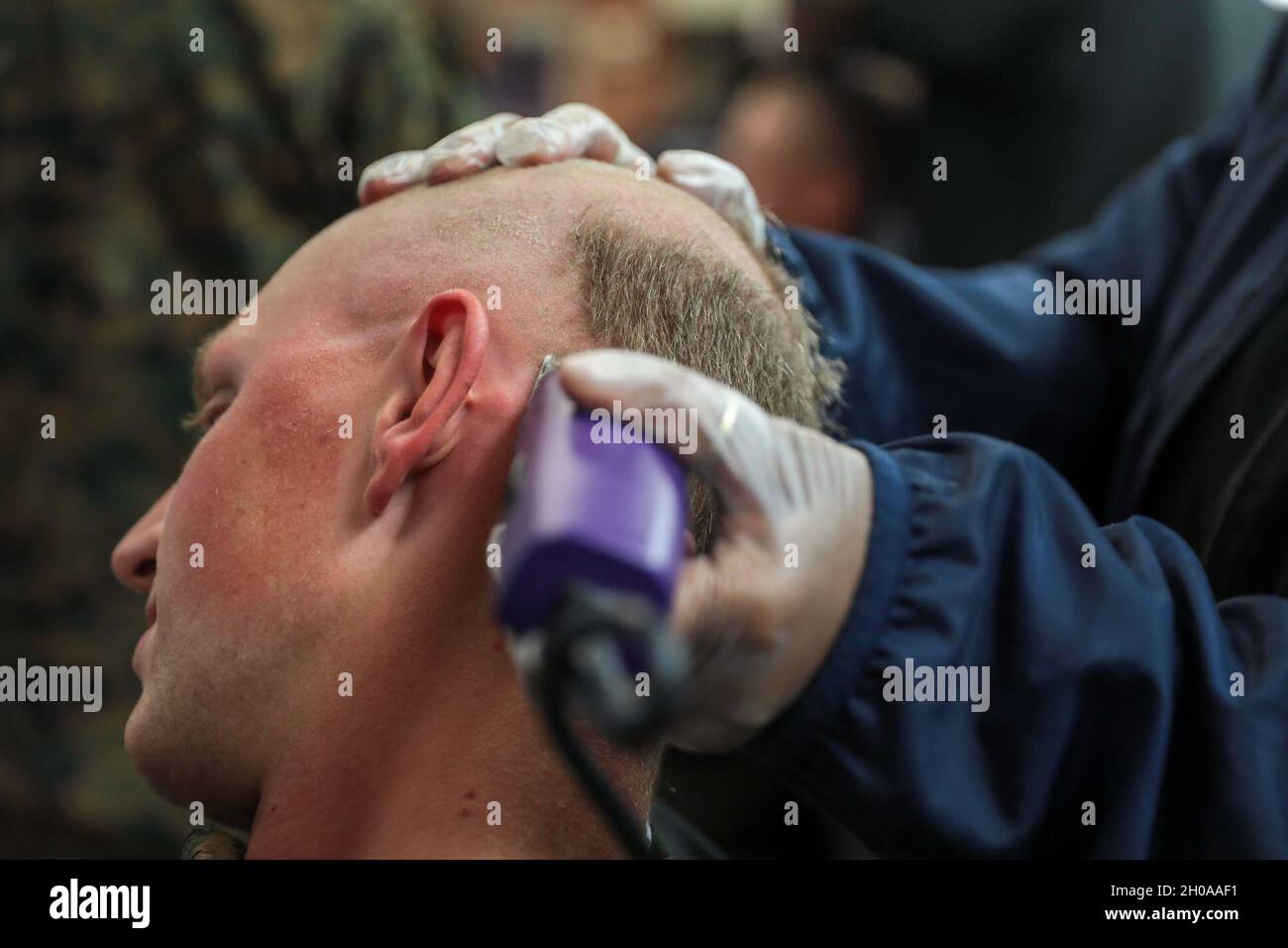 A recruit with Hotel Company, 2nd Recruit Training Battalion, gets a ...