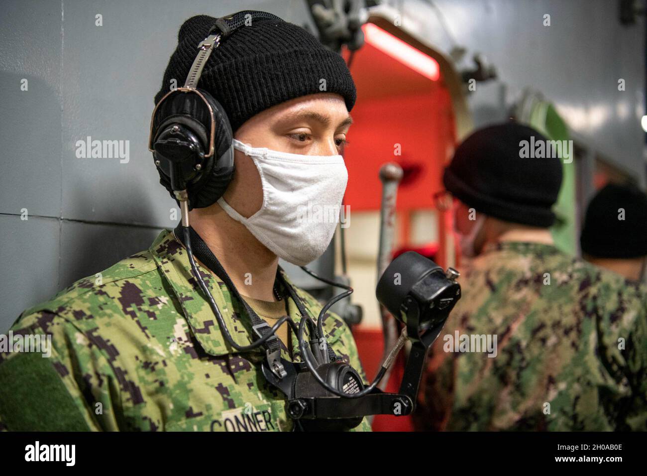 A recruit speaks on a sound powered telephone during an applied ...