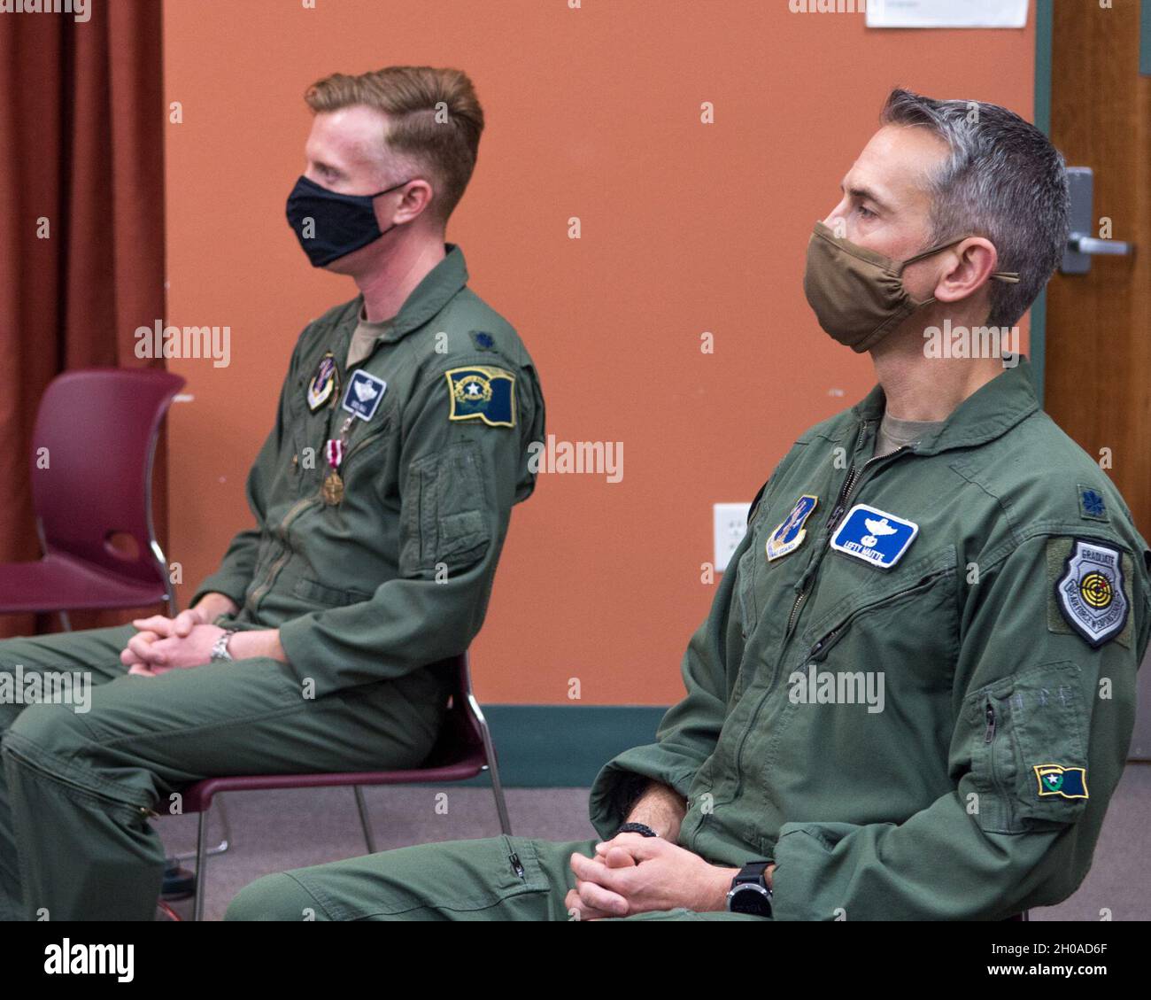 Lt. Col. Justin Galli (left) and Lt. Col. Ethan Waite (right) sit side ...