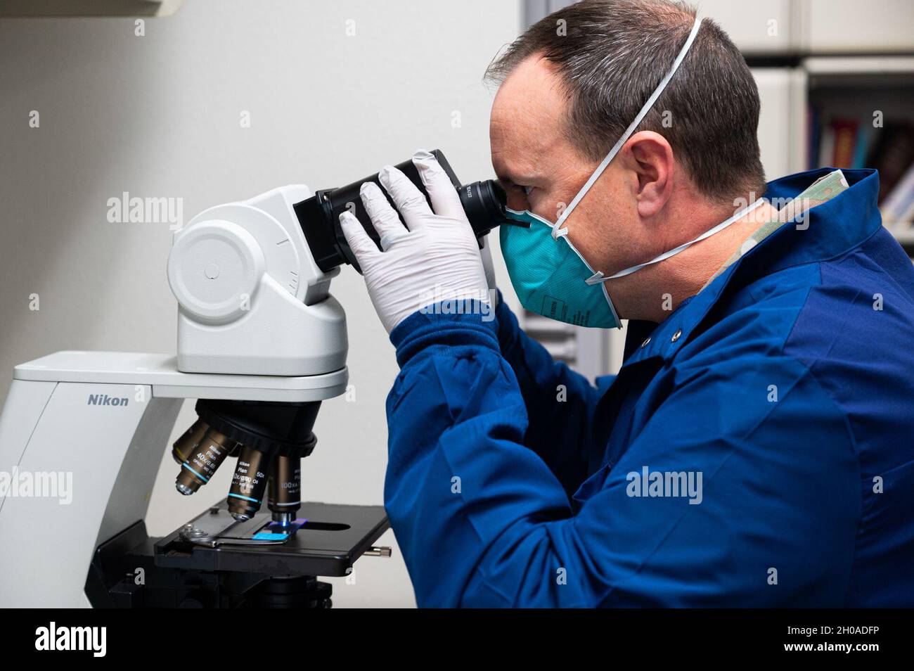 Col. Craig Prather, 47th Flying Training Wing commander, looks into a ...