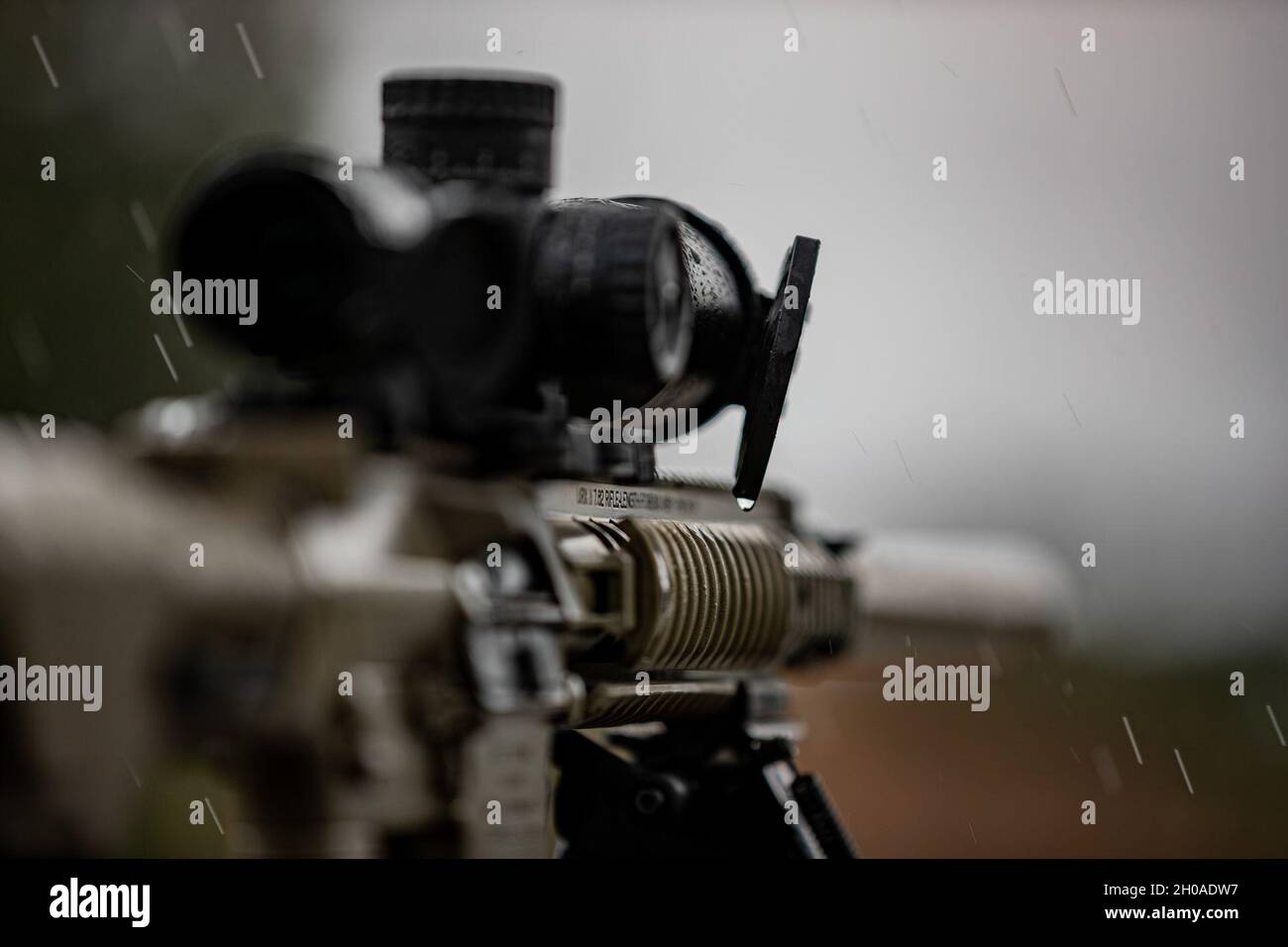 An M110-Semi-Automatic Sniper System (SASS) aims down range during a ...