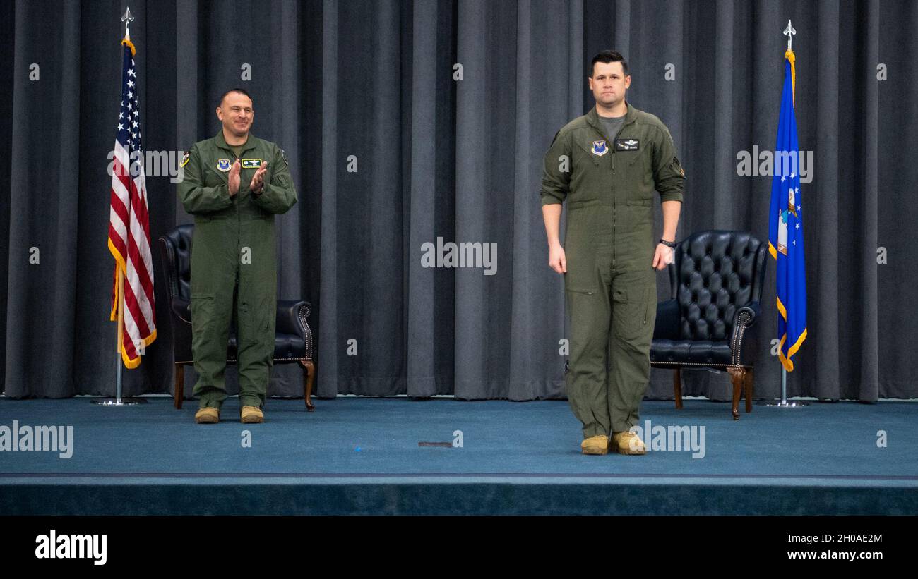 Lt. Col. John Owens, right, incoming 11th Bomb Squadron commander, is ...