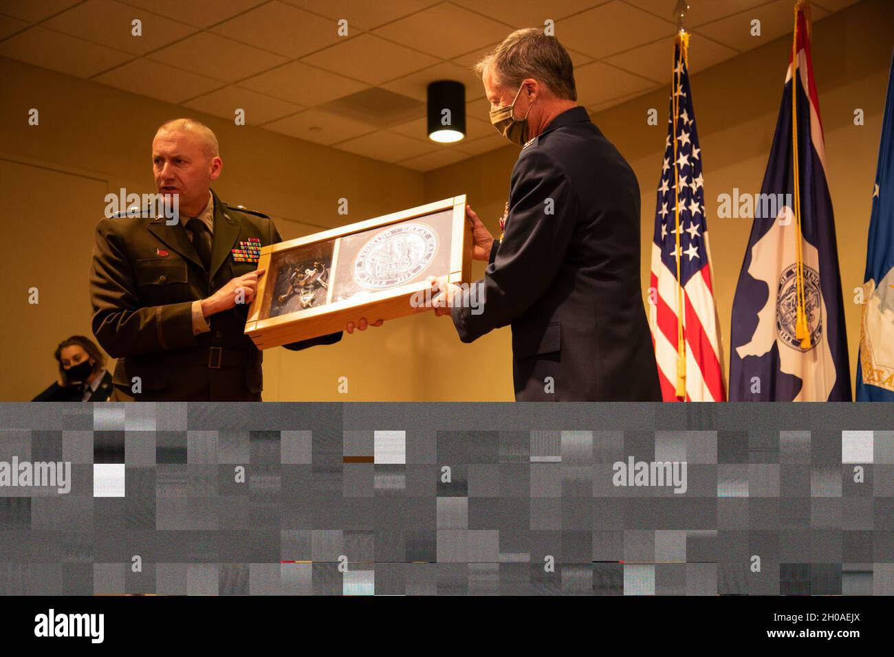 Maj. Gen. Gregory Porter presents Col. Christoper Smith with awards at ...