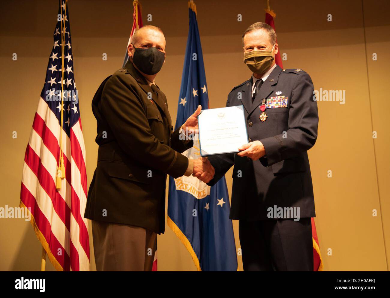 Maj. Gen. Gregory Porter presents Col. Christoper Smith with awards at ...