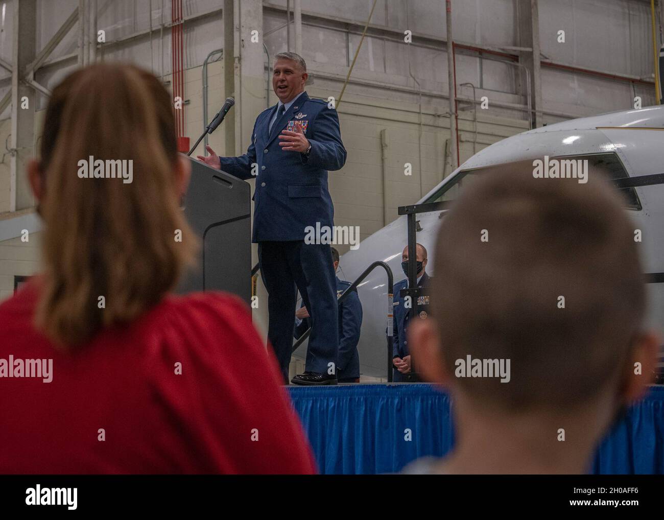 U.S. Air Force Lt. Col. Brent Murrell addresses audience members ...
