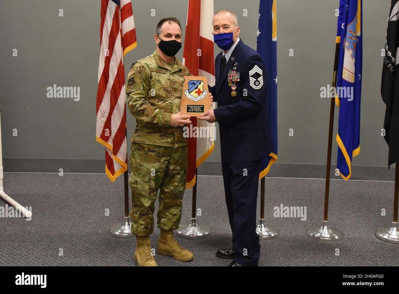 U.S. Air Force Chief Master Sgt. Bryan White (right), chief of the ...