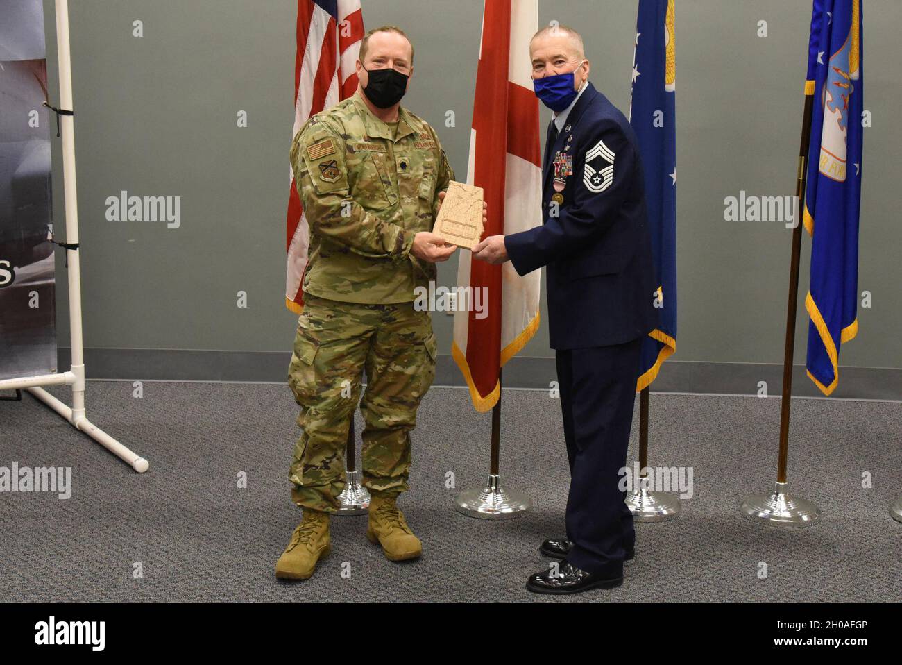 U.S. Air Force Chief Master Sgt. Bryan White (right), chief of the ...