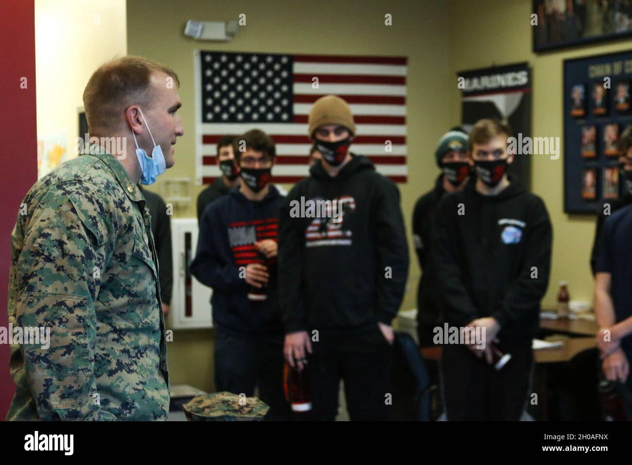 U.S. Marine Maj. Brian Hubert, left, the commanding officer of ...