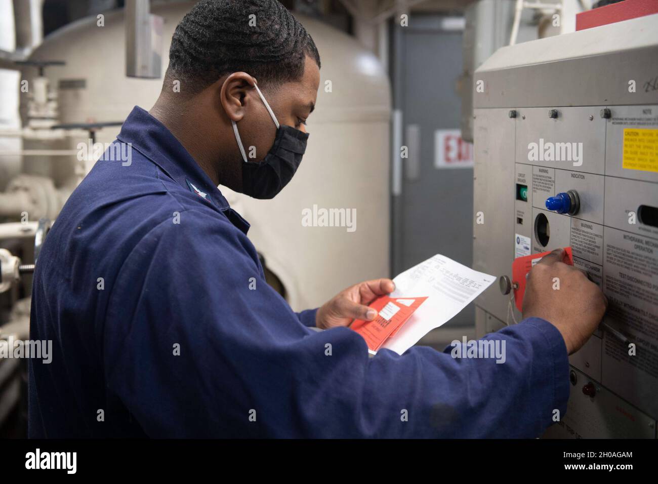 210109-N-FO865-1044 INDIAN OCEAN (Jan. 9, 2020) – U.S. Navy Electrician ...