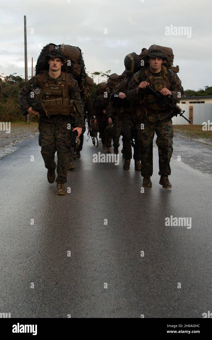 U.S. Marines with 3d Marine Division hike to back to their bivouac ...