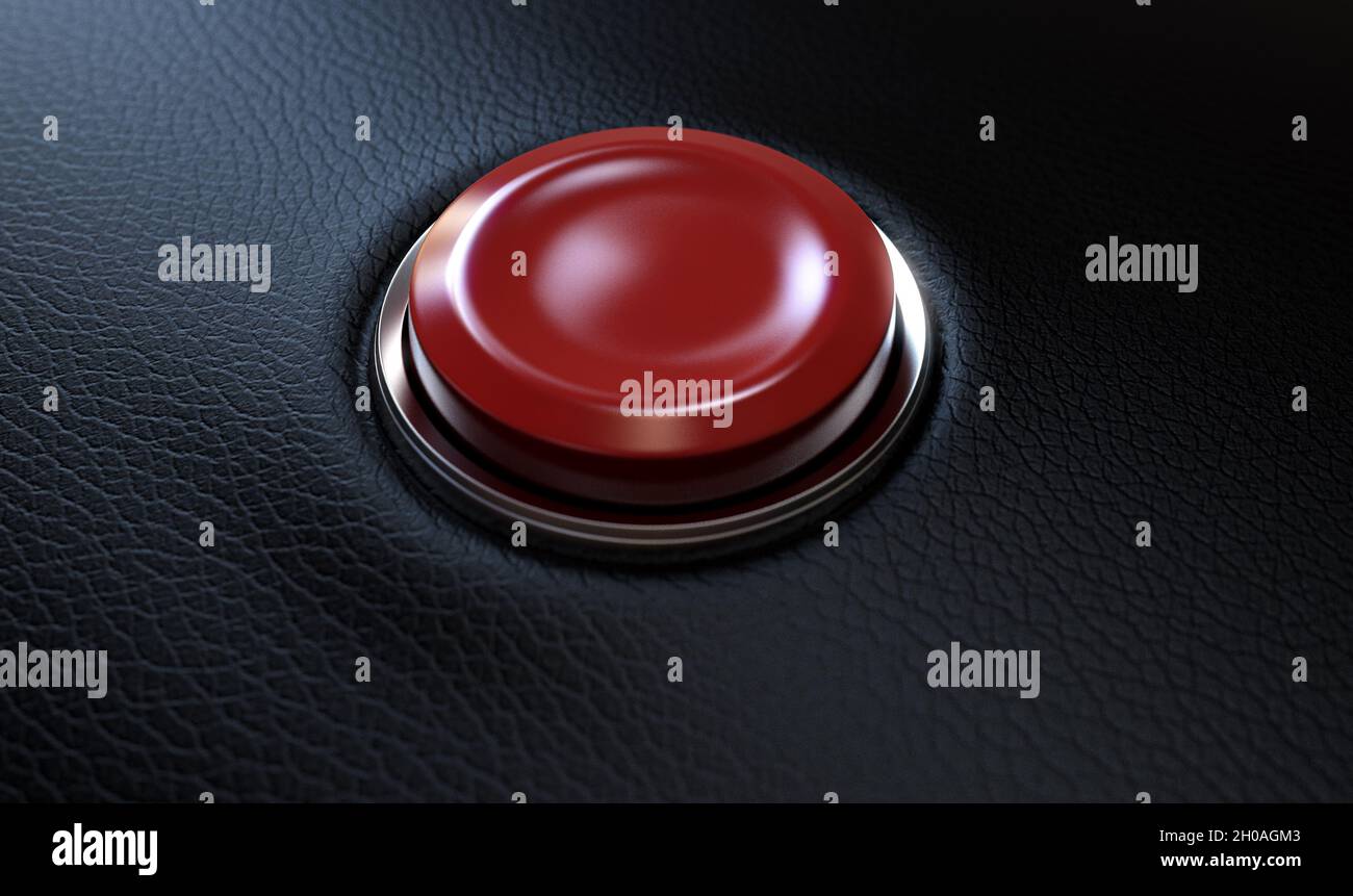 A closeup of a round red button set in a black leather textured surface ...