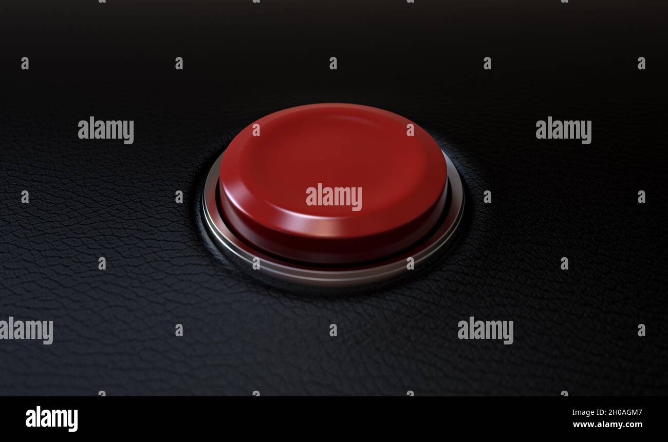 A closeup of a round red button set in a black leather textured surface ...