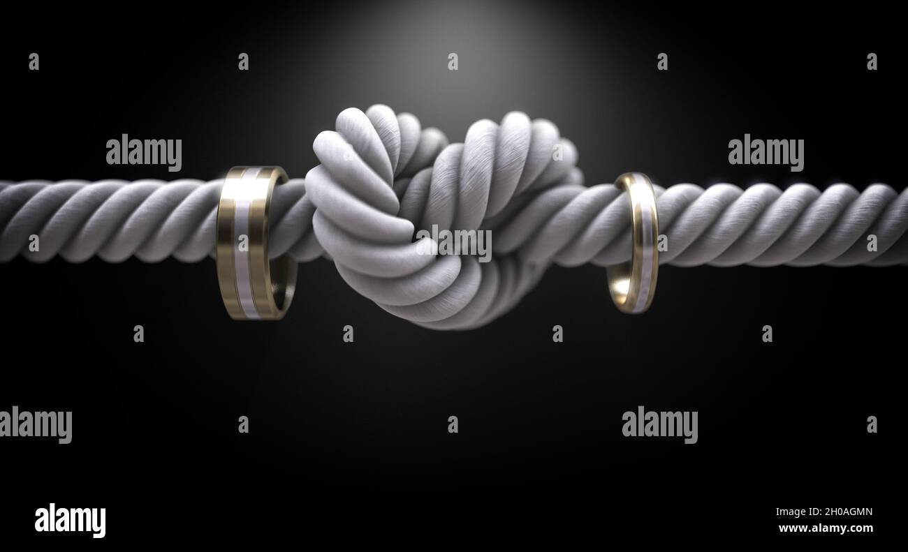 A coarse rope with a knot tied in the middle threaded through two ...