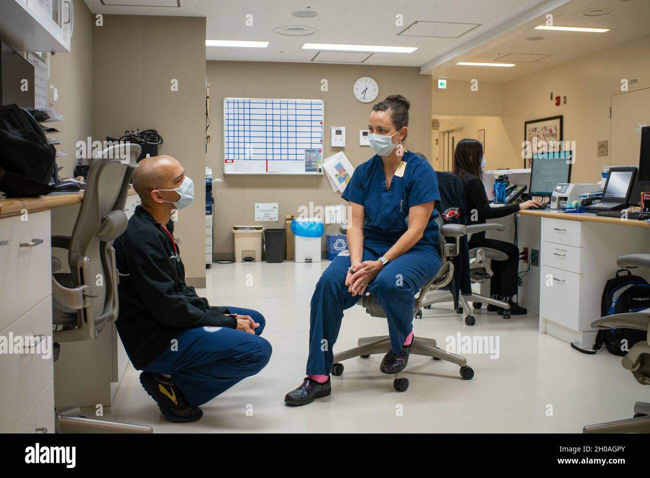 U.S. Navy Lt. Chip LeDuff, left, and Lt. Shauna Ralston, right ...