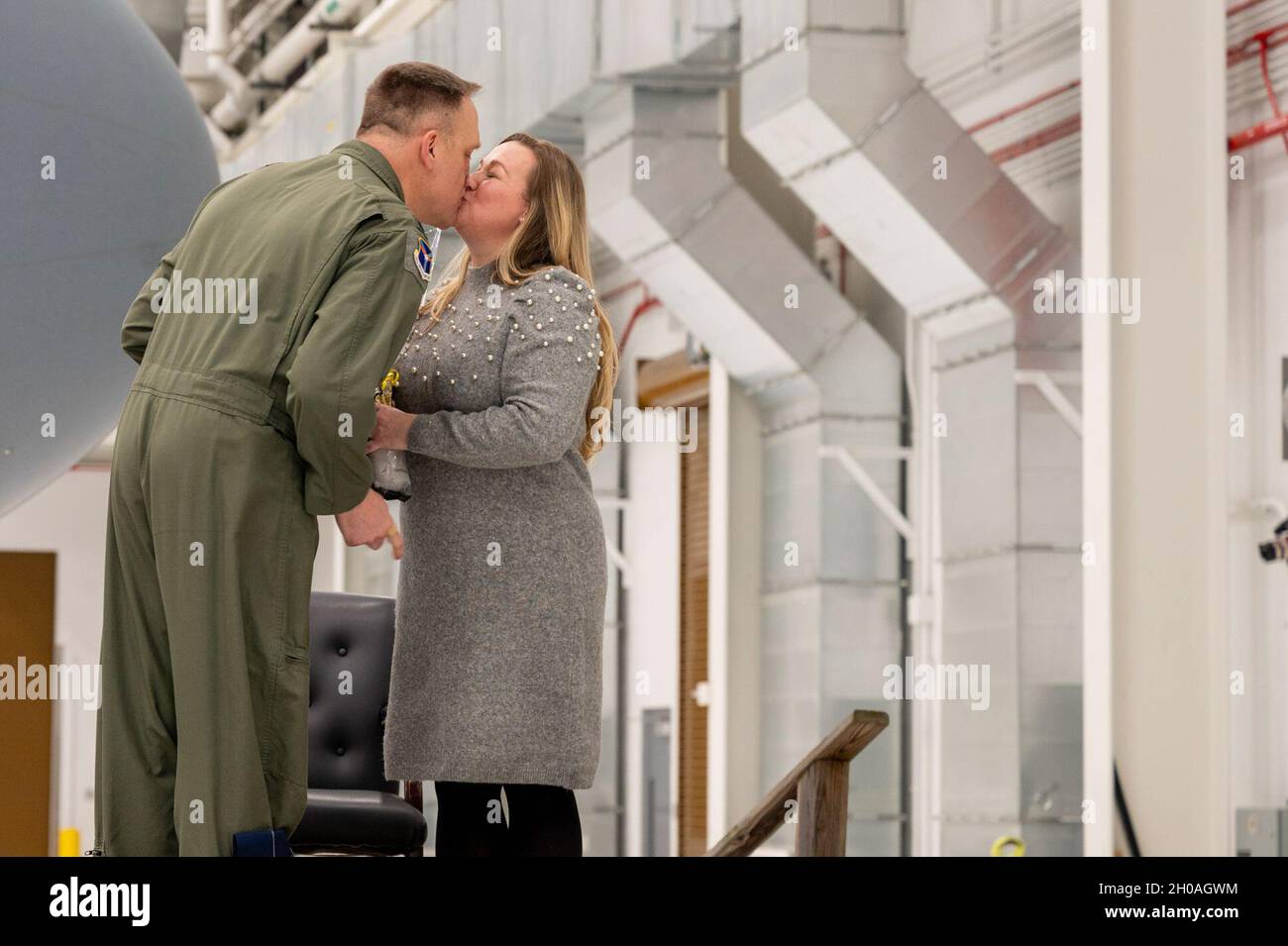 Lt. Col. Bryan Bailey, 911th Operations Group commander, kisses his ...
