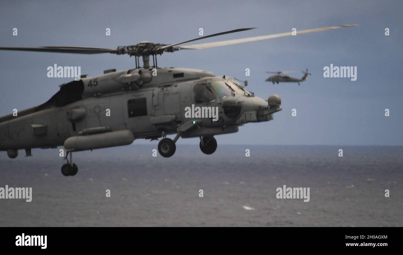 PACIFIC OCEAN (Jan. 10, 2021) An MH-60R Sea Hawk, assigned to the “Wolf ...