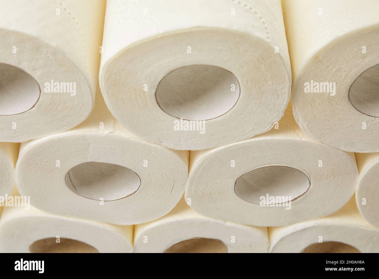 Many rolls of toilet paper as background Stock Photo - Alamy