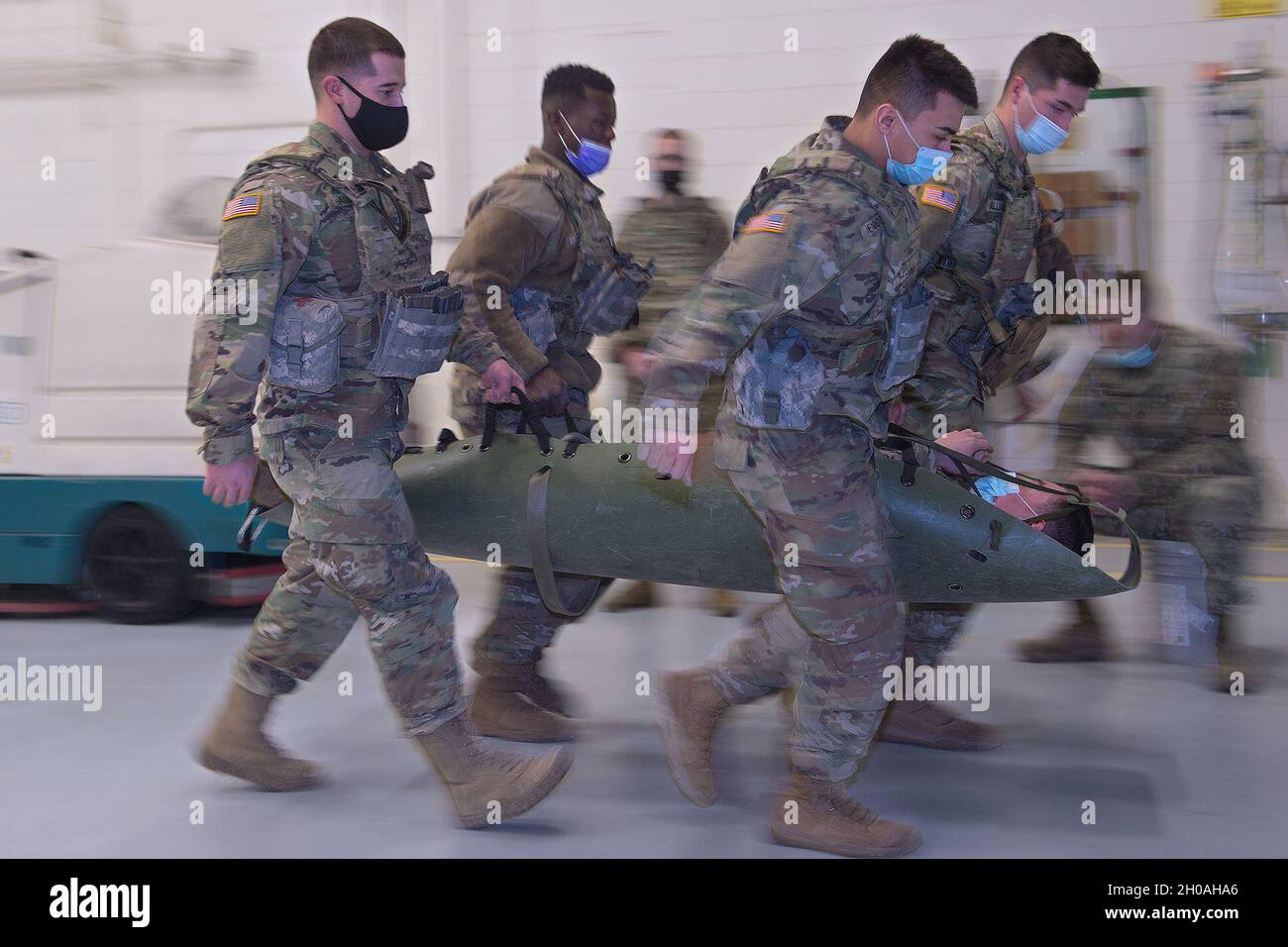 Soldiers from the 2-116th practice carrying a wounded soldier to the ...