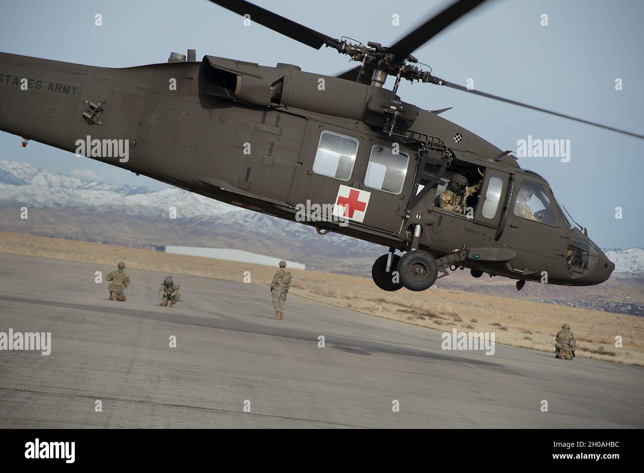 After unloading the UH-60 Black Hawk takes off to circle around and run ...