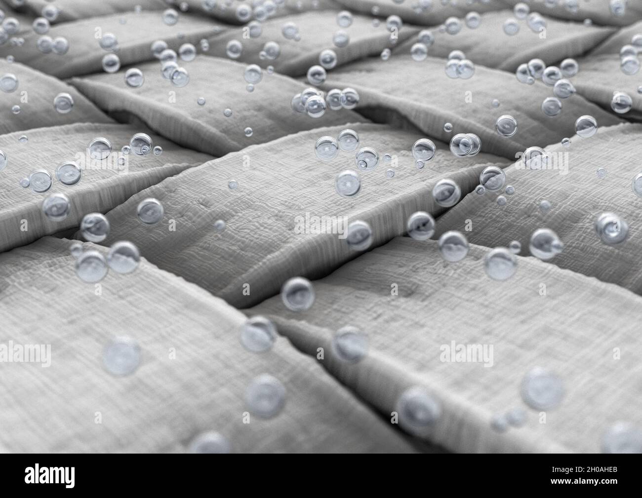 A microscopic view of a simple woven textile fabric and water bubbles ...