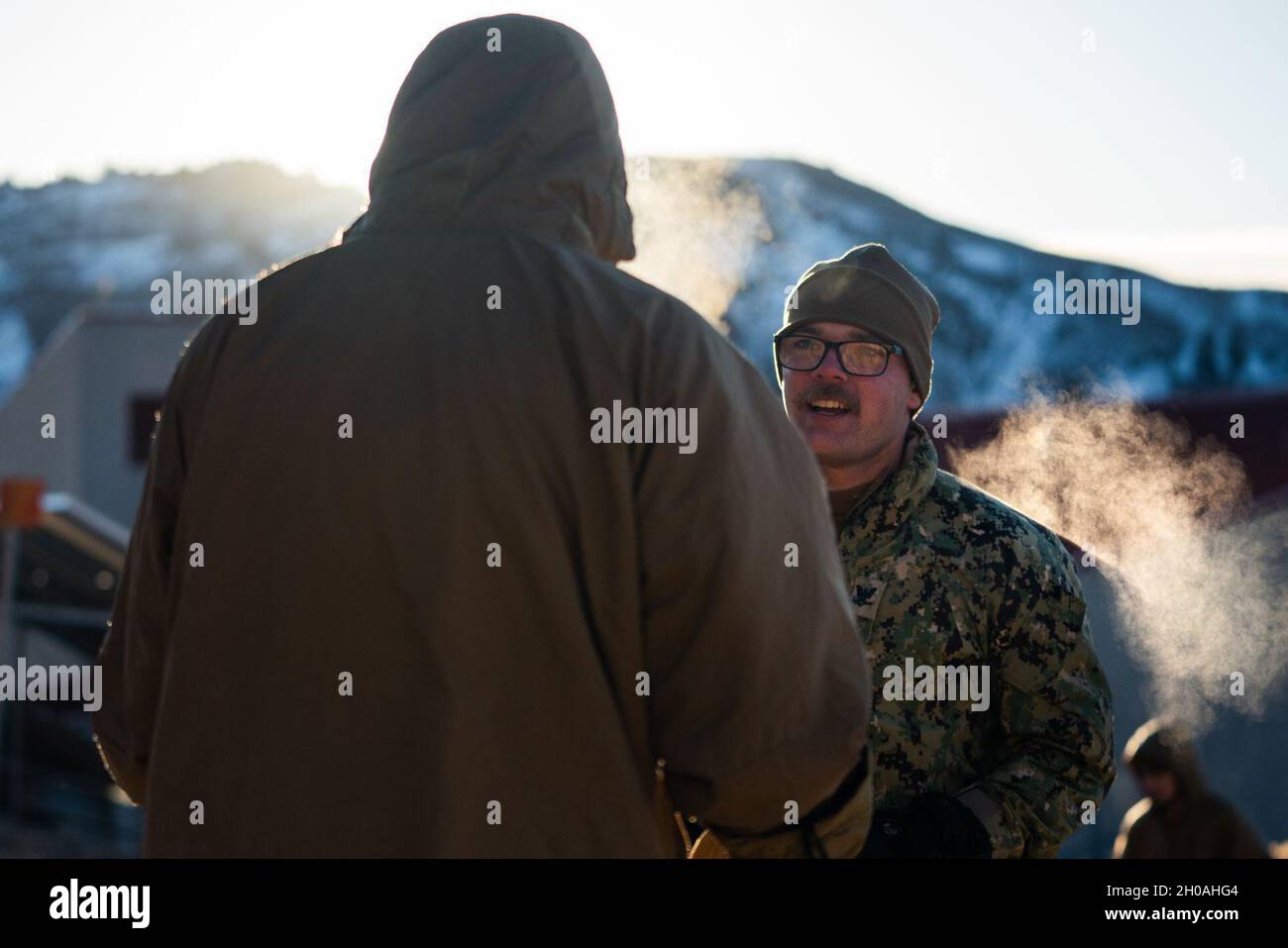 U.S. sailors warm their bodies through exercise after experiencing ...