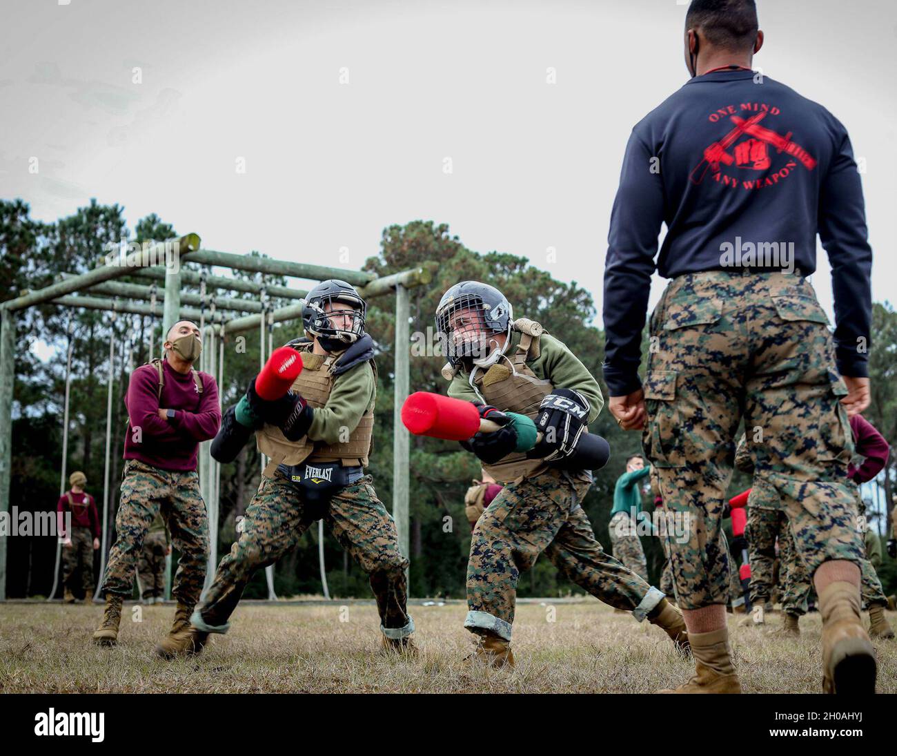 Recruits with Papa Company, 4th Recruit Training Battalion, conduct pugil sticks bouts aboard ...